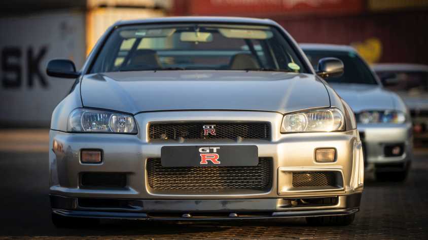 Family-Friendly Godzilla: Remembering The Ultra-Rare 4-Door R34 Nissan ...