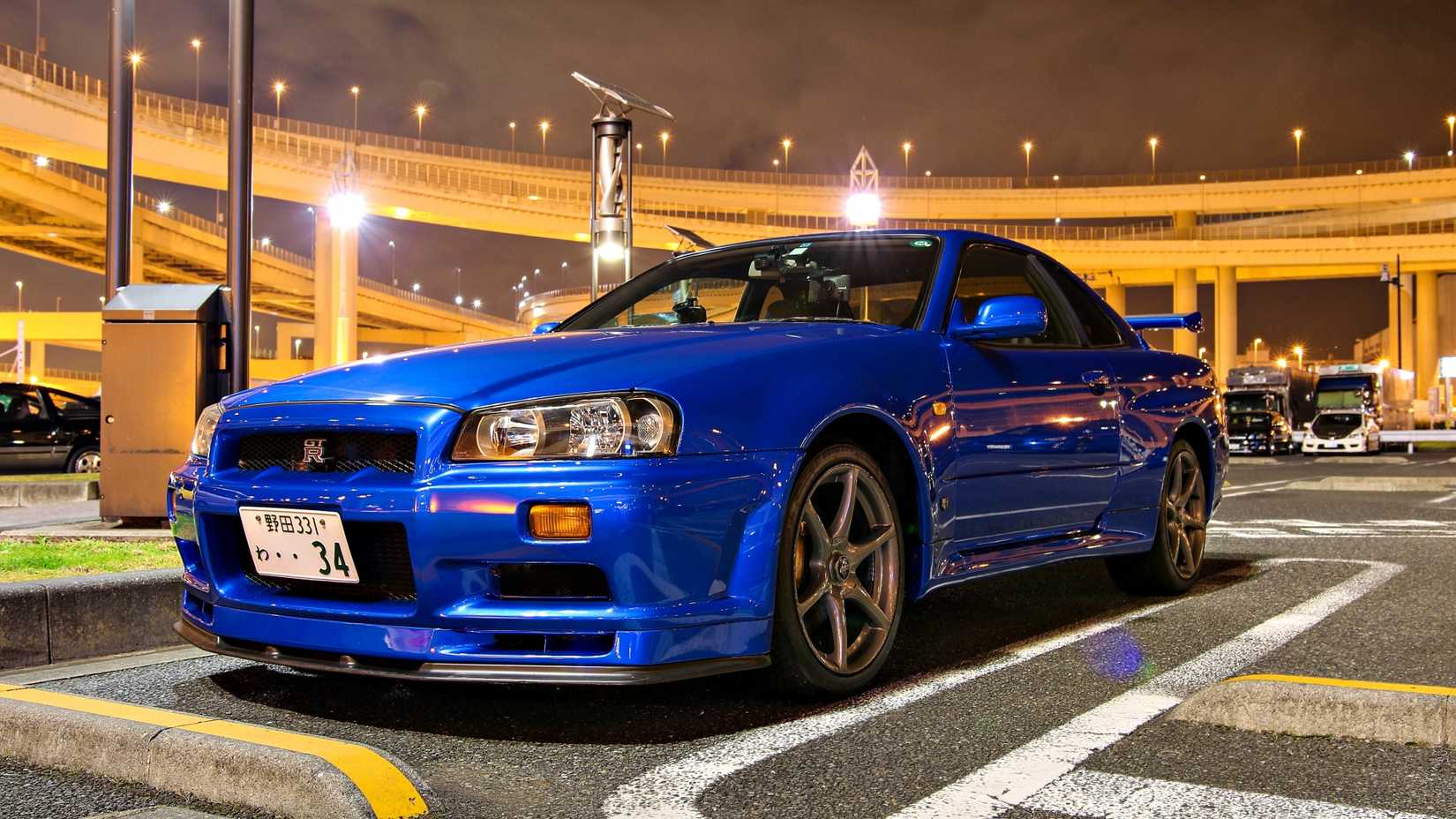 Family-Friendly Godzilla: Remembering The Ultra-Rare 4-Door R34 Nissan ...