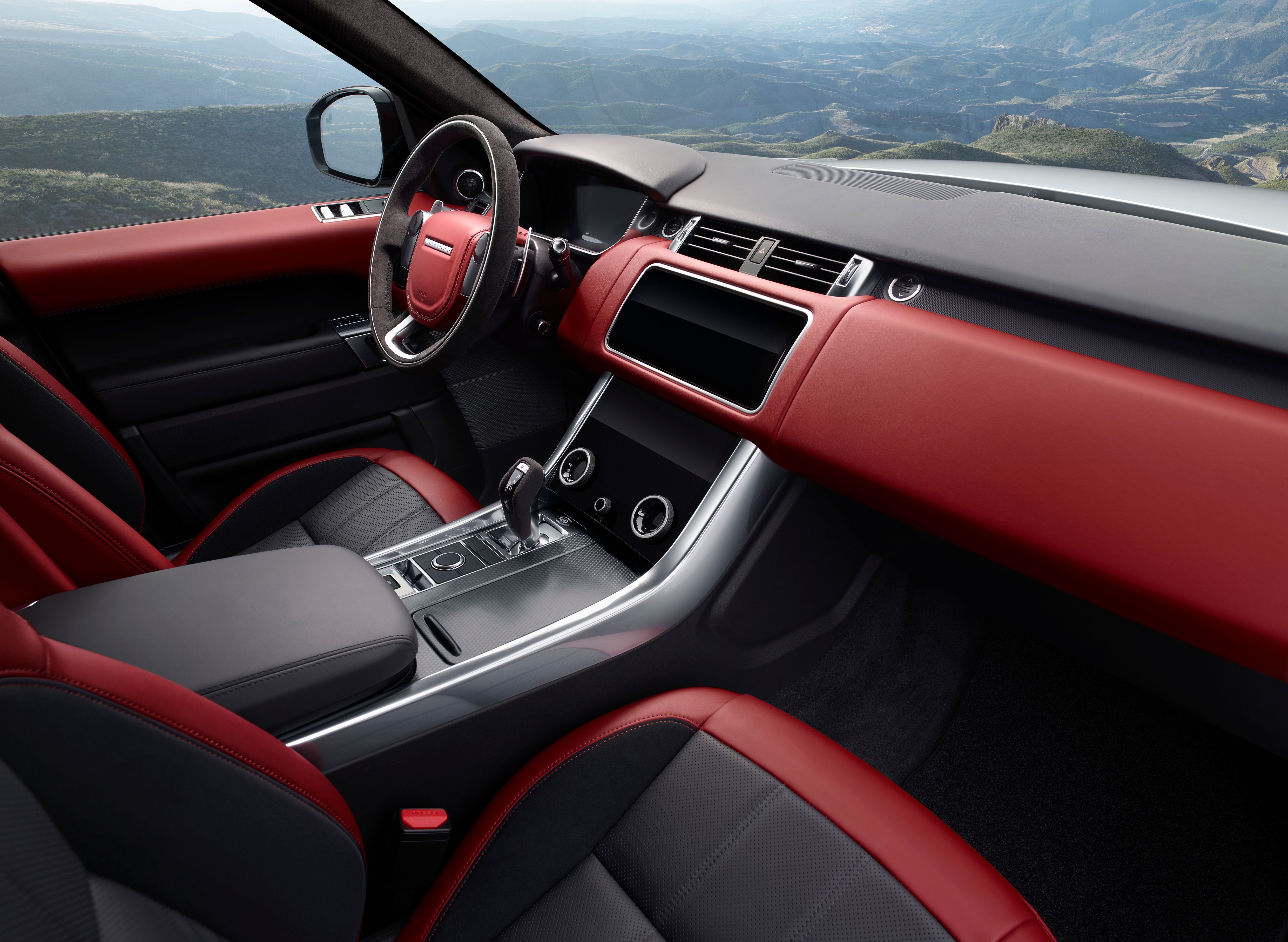 White range rover with red interior store
